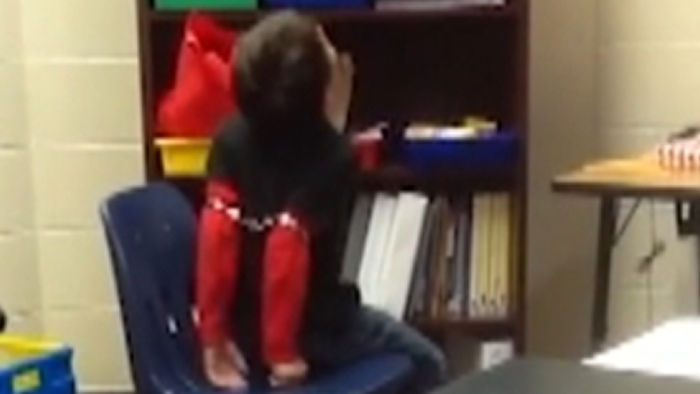 Caught on camera: child shackled | 12news.com