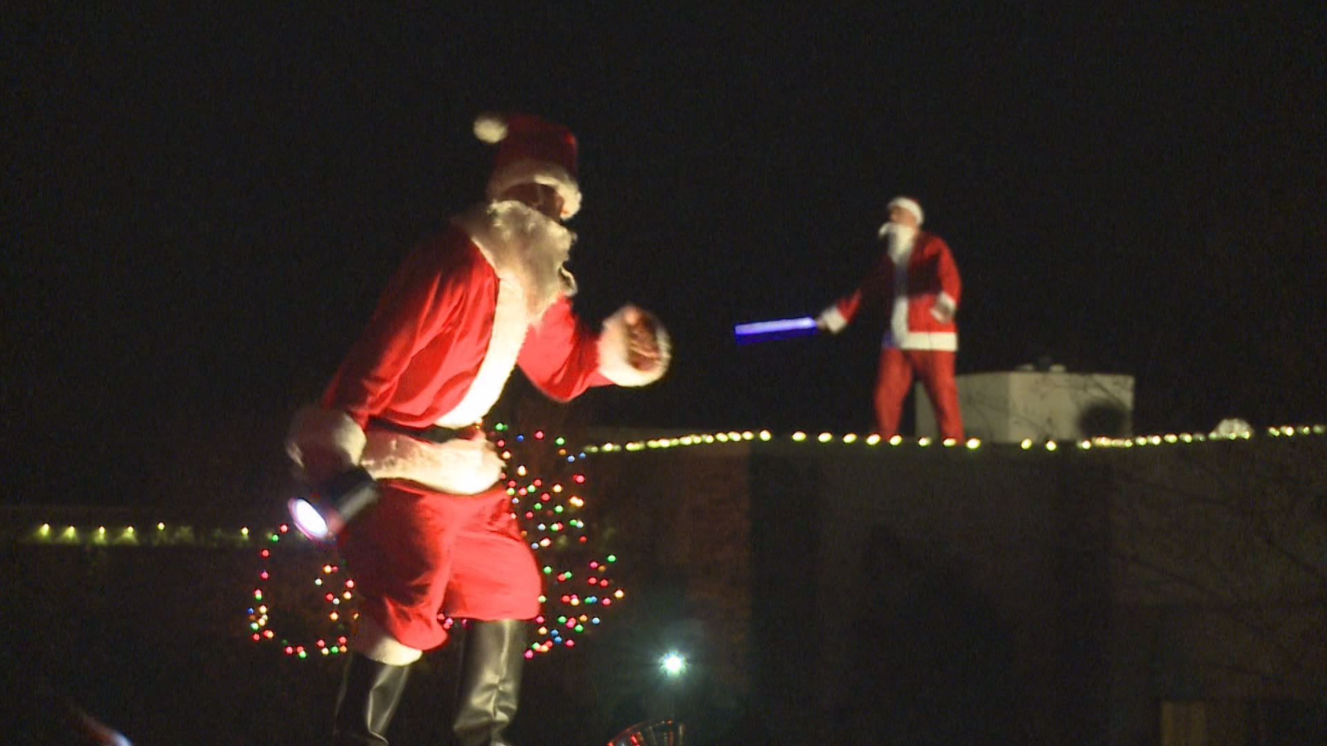 Dancing Santas wow crowds on Christmas Eve | 12news.com