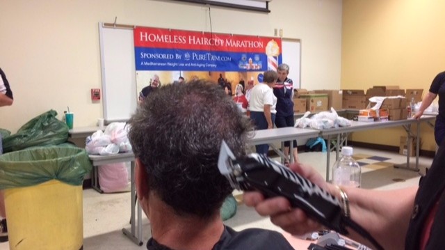 Hundreds of homeless get free haircuts | 12news.com