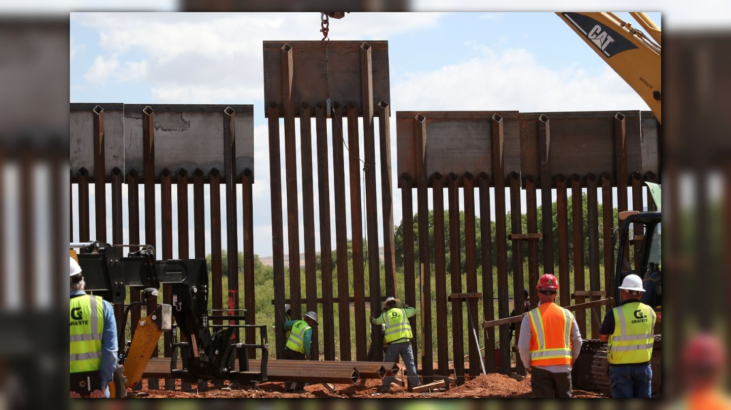 Crews install final panel in effort to replace 'outdated' border ...